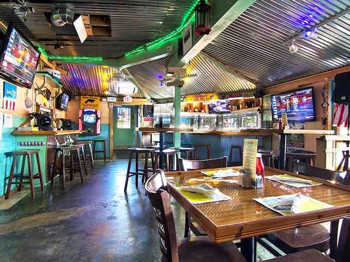 Corrugated metal ceilings and turquoise walls create the perfect backdrop for serious seafood eating and game watching.