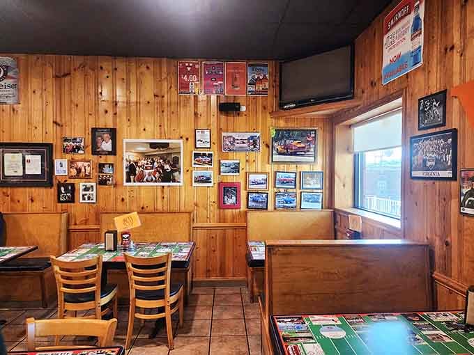 Wood paneling and memorabilia create the kind of cozy atmosphere where strangers become friends over lunch.