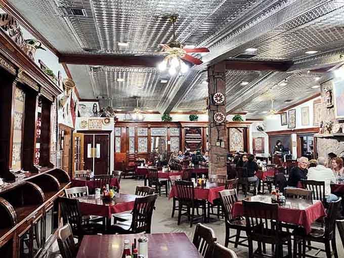Tin ceilings and wooden tables tell stories of a century's worth of hungry travelers finding comfort here.