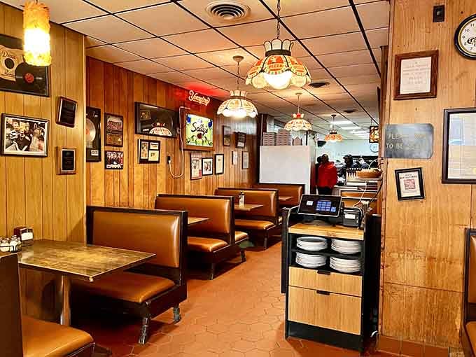 Wood paneling and vintage booths create a time capsule where the only thing that matters is the pie.