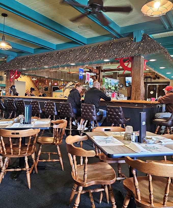 That thatched roof tiki bar isn't messing around, bringing serious tropical vibes to the heartland with style.