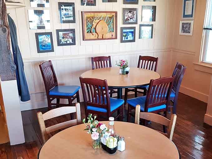 Round tables, framed memories, and wooden chairs that have supported more fishing stories than you can imagine.