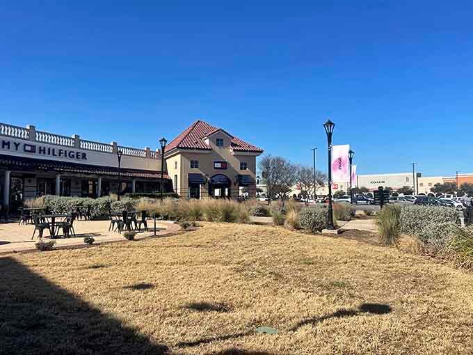 Outdoor seating areas offer respite between shopping sprints, where weary bargain hunters can catch their breath.