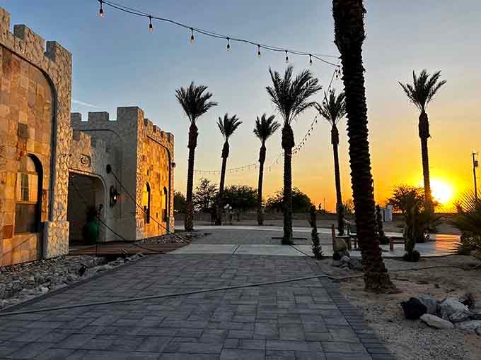 Golden hour transforms this castle into pure magic, proving that even knights needed spectacular sunset views for morale.