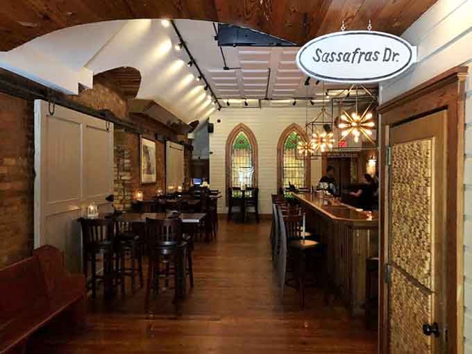 Exposed brick, wooden beams, and stained glass windows create an atmosphere that's equal parts rustic and refined.