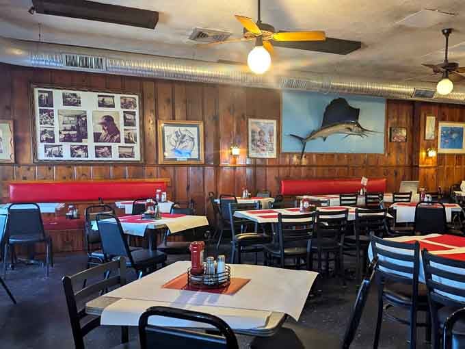 Wood paneling, mounted fish, and paper-covered tables create the perfect stage for Maryland's messiest, most delicious tradition.