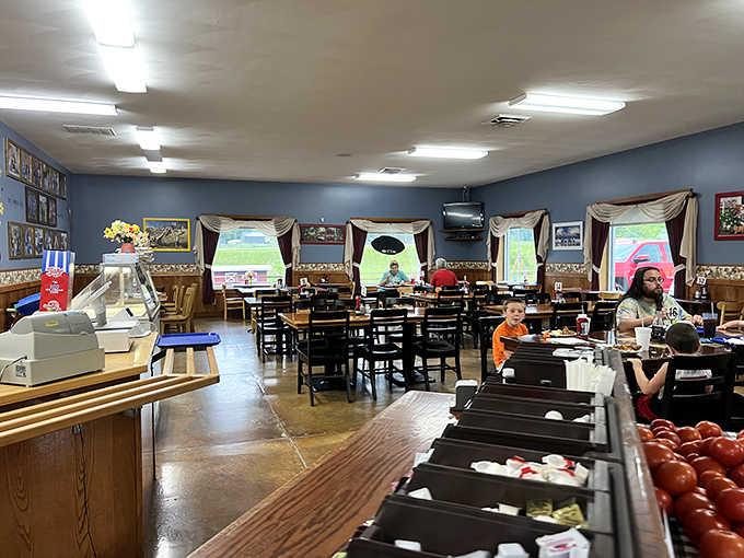 The dining room's cheerful simplicity lets the real star shine: that buffet loaded with homestyle treasures.