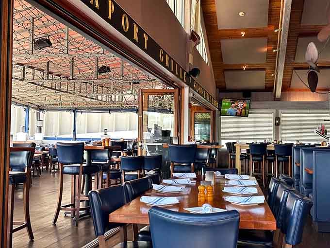 Floor-to-ceiling windows frame the harbor like a masterpiece while you dine in comfortable nautical elegance.