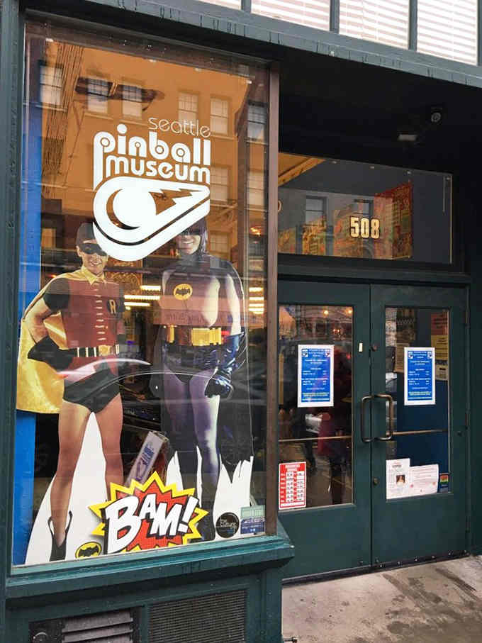 That storefront window promises exactly what's inside: pure, unapologetic pinball joy in Seattle's International District.