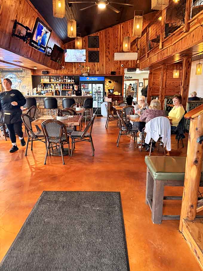 Wood paneling and warm lighting create the perfect atmosphere for serious meat consumption and zero regrets.