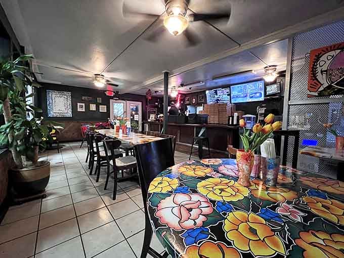 Those hand-painted floral tables are like dining on a garden in full bloom, bringing joy to every slice.