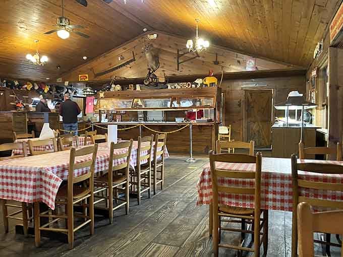 Checkered tablecloths and wooden beams create the kind of cozy atmosphere where calories mysteriously don't count.