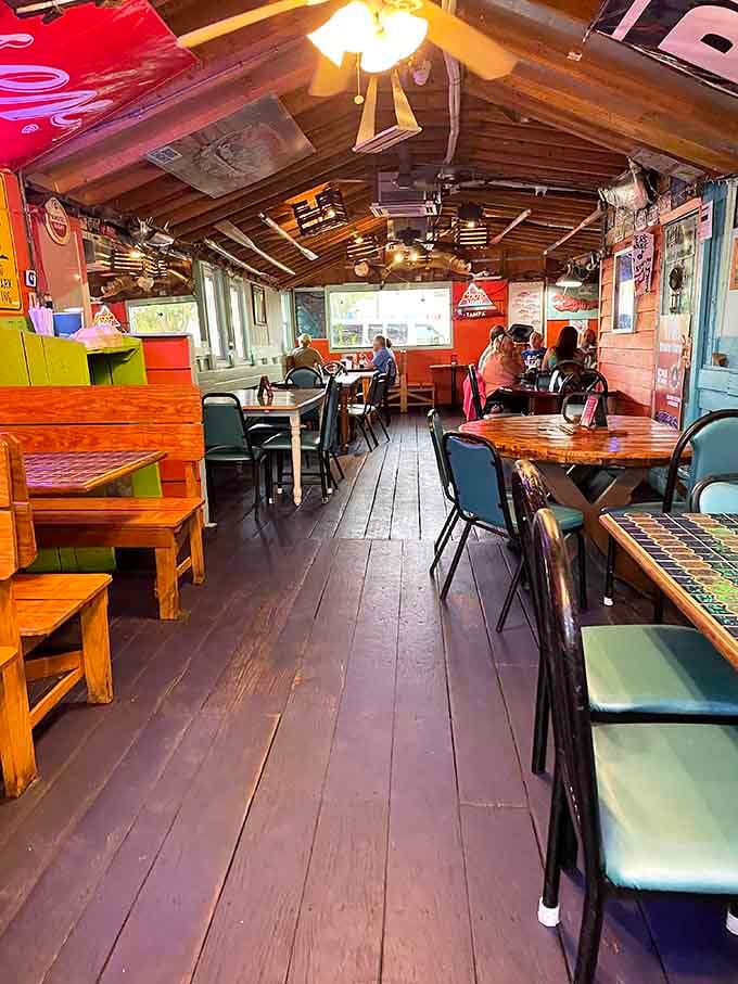 Wooden floors, mismatched chairs, and ceiling fans spinning stories of countless memorable meals shared here over the years.