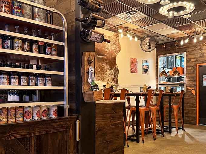 Industrial chic meets barbecue comfort, where corrugated ceilings and warm lighting create the perfect meat-eating atmosphere.