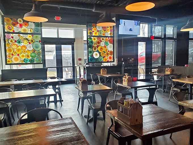 Colorful circular art and natural light transform this dining space into somewhere you'll want to linger long after dessert.