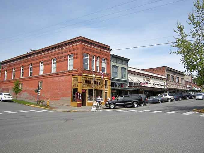 Red brick architecture meets small-town charm where every storefront promises another adventure in treasure hunting and discovery.