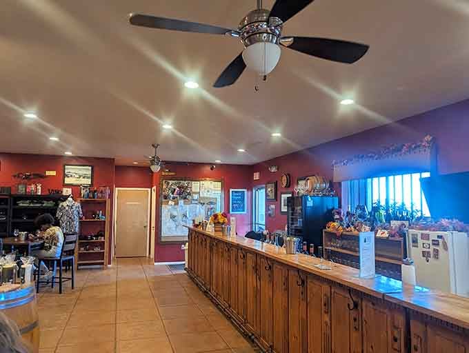 That warm terracotta wall and wooden tasting bar create an atmosphere more inviting than your favorite aunt's kitchen.