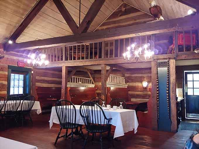 Cathedral ceilings meet frontier charm, and yes, that eagle is judging your table manners from above.