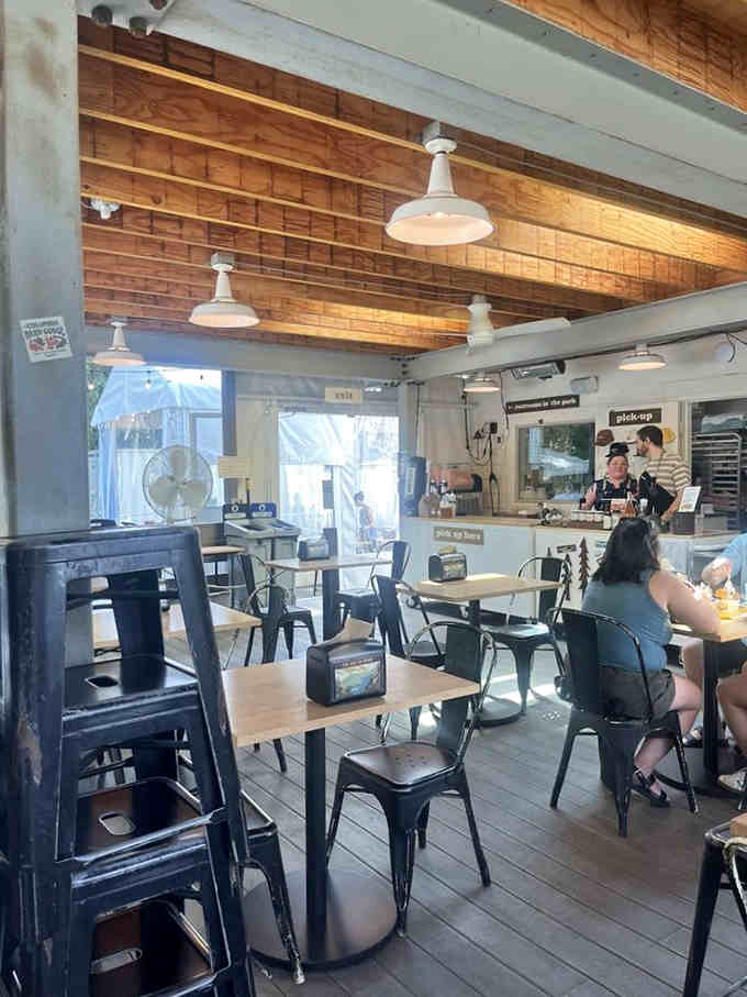 Industrial-chic meets cozy comfort with warm wood tones and pendant lights that make you want to linger longer.