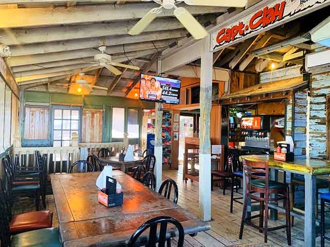 Rustic wooden beams and mismatched chairs create the kind of atmosphere where good food matters more than fancy decor.