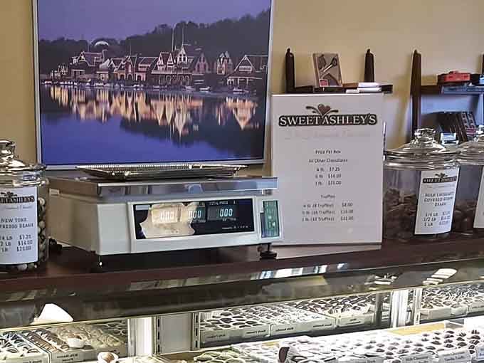 Behind that scale and Boathouse Row artwork lies a counter where chocolate dreams are weighed and packaged.