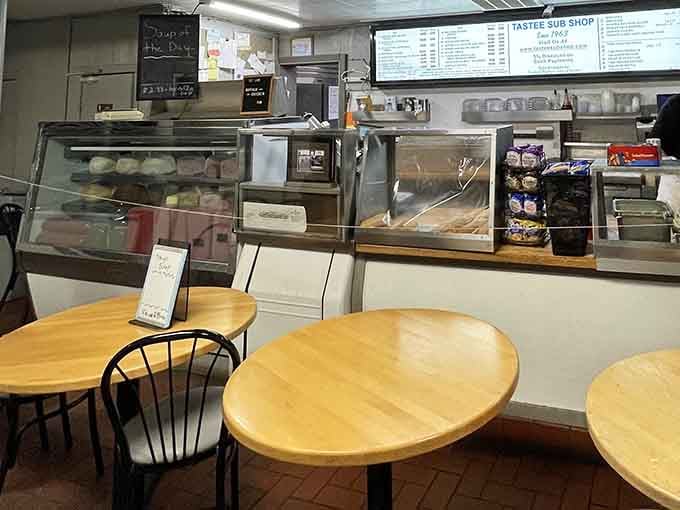 No frills, no fuss, just honest tables and a counter where sandwich dreams come true daily.