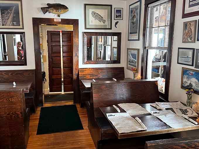 Dark wood and maritime art create an atmosphere that's equal parts museum and your favorite neighborhood hangout.