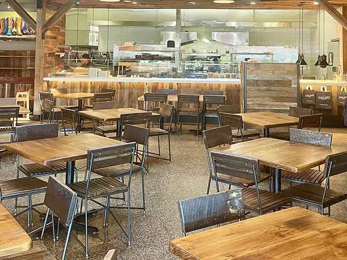 Clean lines, wood tables, and an open kitchen where all the smoky magic happens right before your eyes.