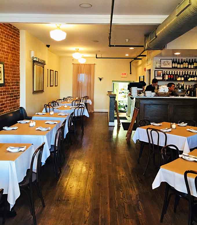 Clean lines, exposed brick, and white tablecloths create an atmosphere that's fancy enough to impress, casual enough to relax.