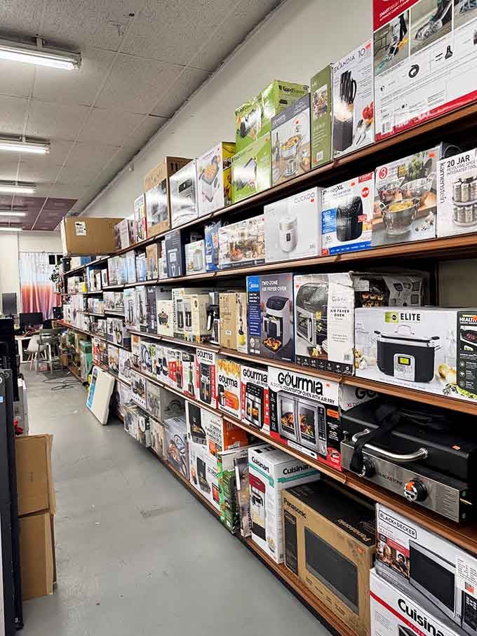Kitchen appliances stacked high like a culinary lover's dream, all waiting for their forever homes.