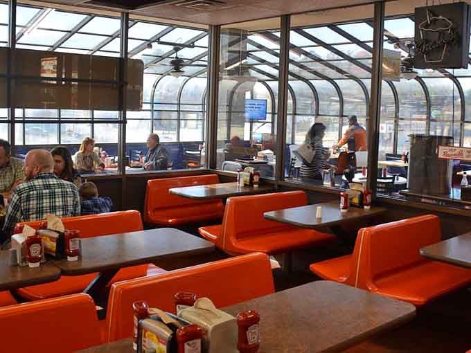 Those orange booths have witnessed decades of happy diners, and those wraparound windows let you watch the world go by.