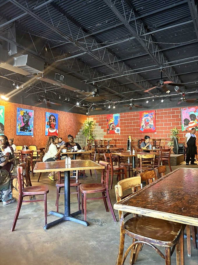 Inside, vibrant art meets hungry diners in a space that feels like Houston's living room at breakfast time.