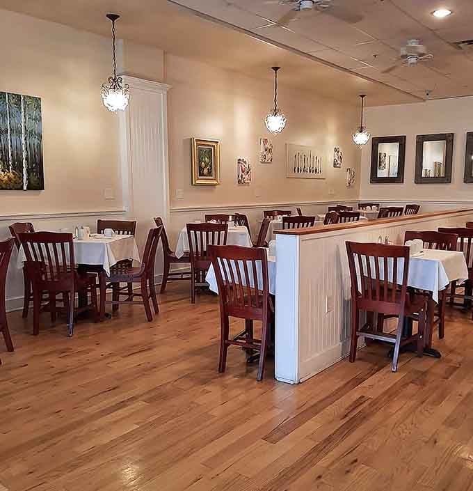 White tablecloths and warm wood floors create the kind of breakfast sanctuary your mornings have been missing.