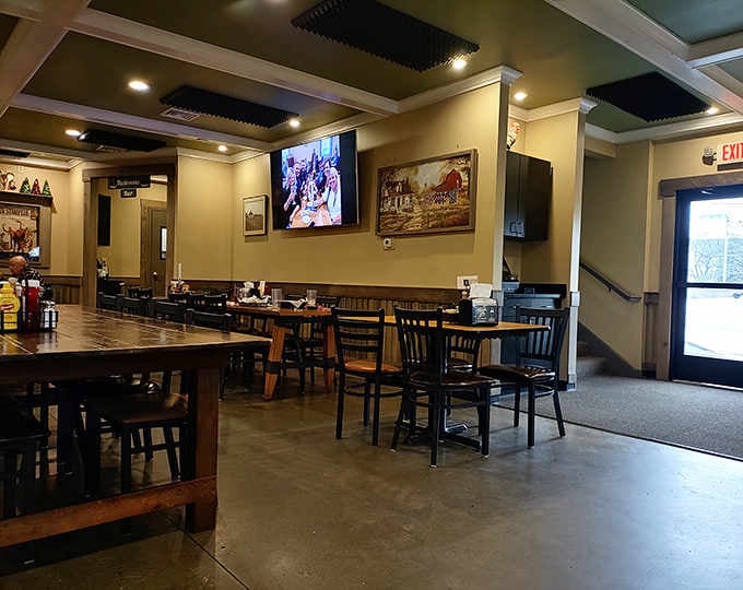 Step inside where wooden tables and warm lighting create the perfect setting for serious comfort food conversations.