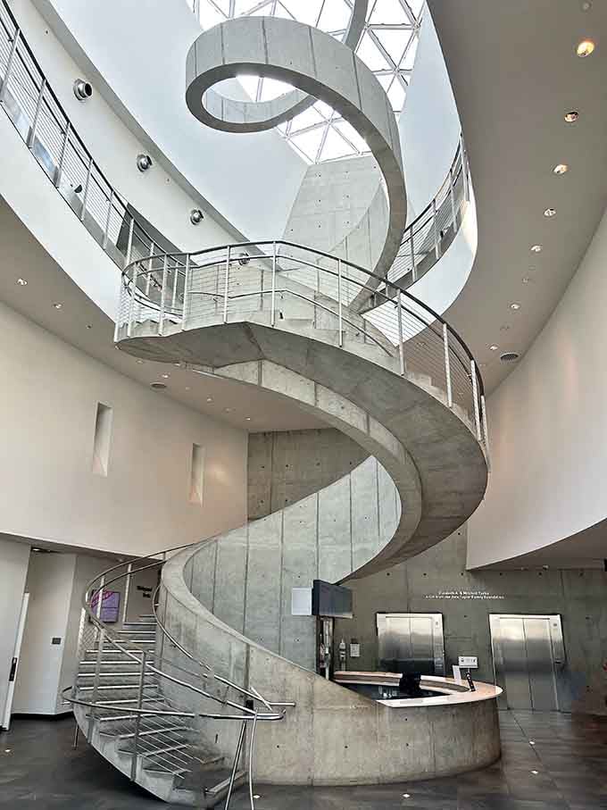 This helical staircase spirals upward like Dal&iacute;'s mustache decided to become architecture and show off a bit.
