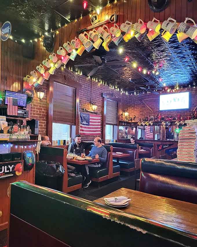 Firefighter boots dangling overhead and vintage memorabilia everywhere create nostalgia you can practically taste with your burger.