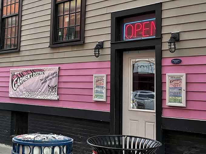 The neon OPEN sign beckons like a beacon for bargain hunters and treasure seekers alike.