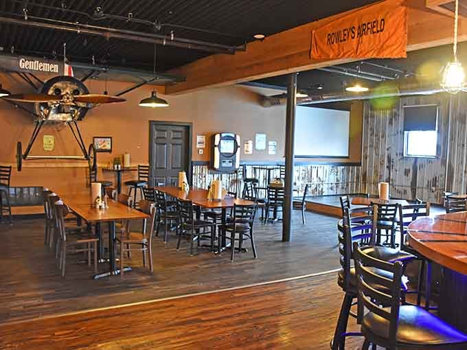 Aviation memorabilia meets comfort food in a space that feels like a museum you can actually eat in.