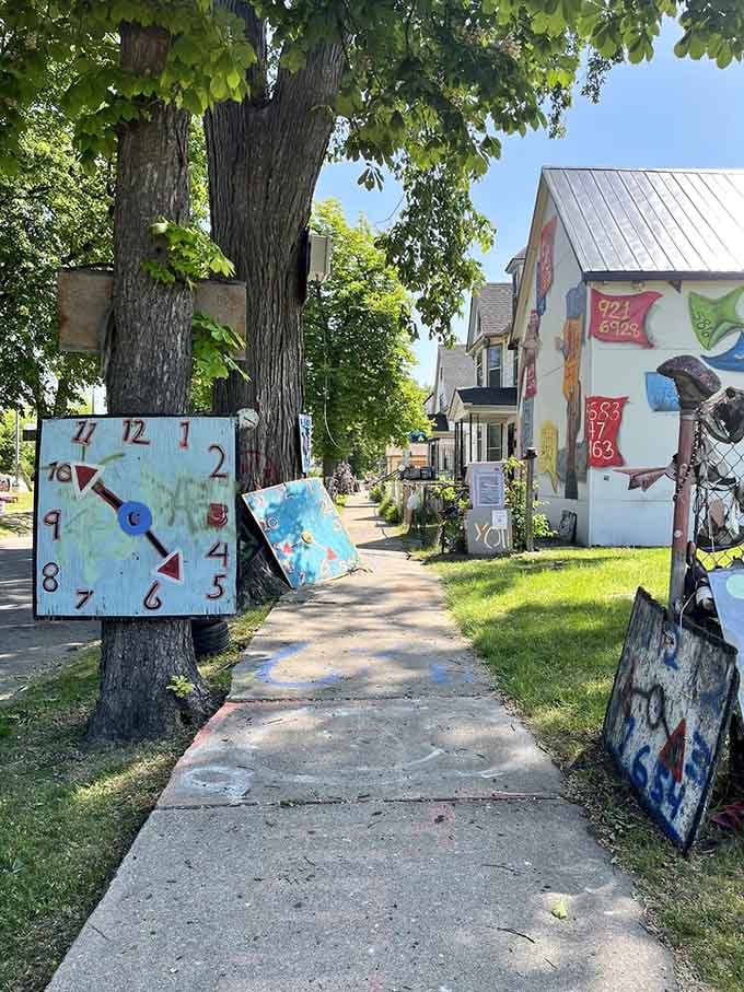 Follow the painted sidewalk where time literally grows on trees and reality takes a creative coffee break.