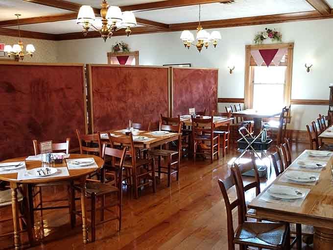 Simple wooden tables and chairs create the perfect setting for what's about to become a legendary meal.