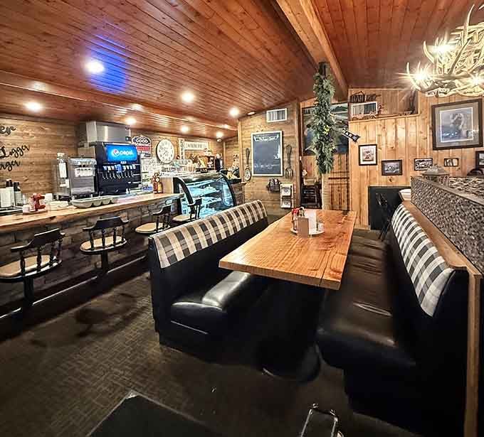 Wood-paneled walls and cozy booths create the perfect setting for serious burger consumption and pie contemplation.