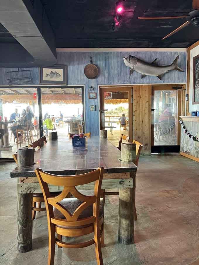 Weathered wood and mounted fish tell stories that fancy restaurants with their Edison bulbs never could.