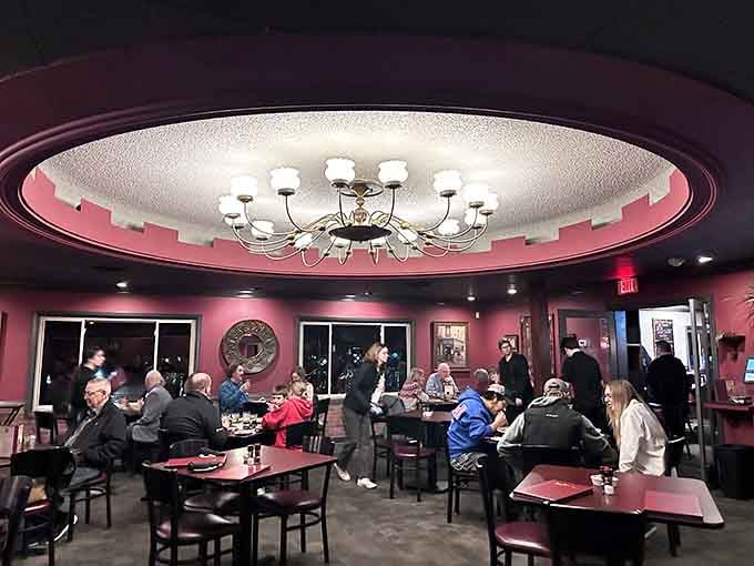 The warm glow and circular ceiling detail create an atmosphere where time slows down and conversations actually happen without phones interrupting.