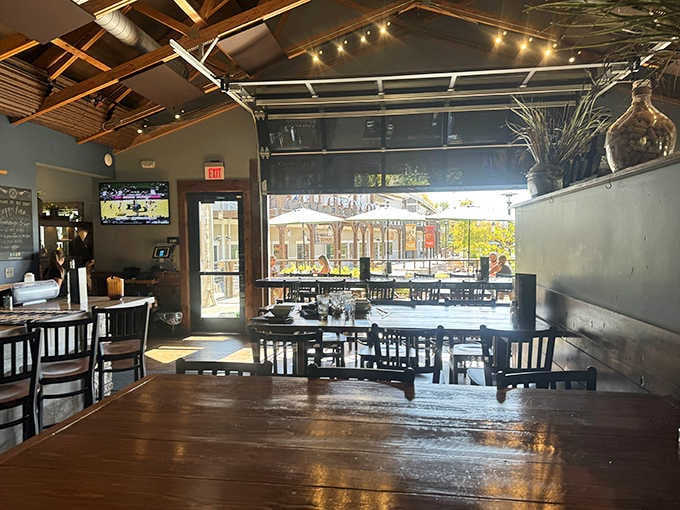 Those garage doors open up to pure magic, blending indoor comfort with breezy outdoor vibes all year long.