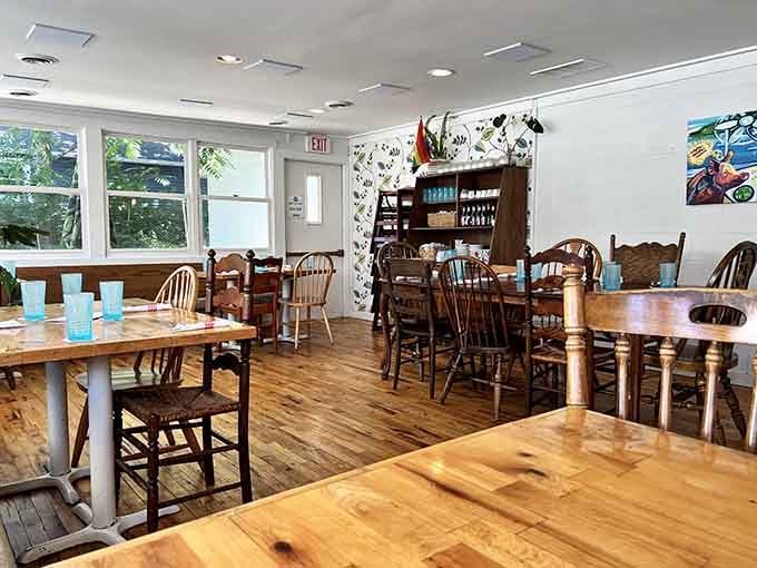 Simple wooden tables and cozy seating create the perfect setting for serious fried chicken consumption and lingering conversations.