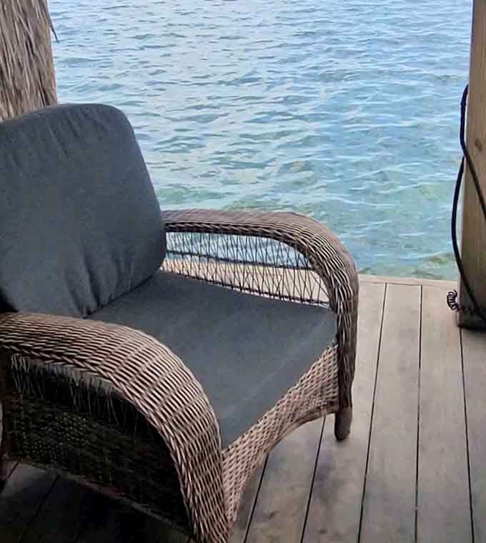 Wicker chairs never looked so inviting, especially when your office view is literally the Atlantic Ocean.