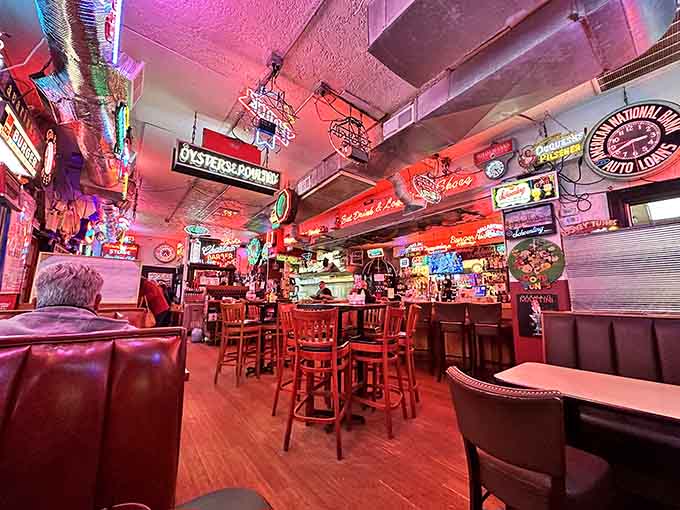 Neon signs and vintage memorabilia create a visual feast before your actual feast even arrives at the table.