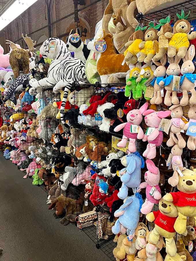 This wall of plush friends proves that happiness can indeed be measured in stuffed animals per square foot.