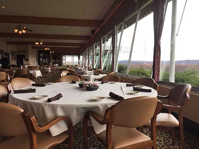 Floor-to-ceiling windows frame the Mississippi River valley like nature's own artwork, complimenting your perfectly cooked steak.