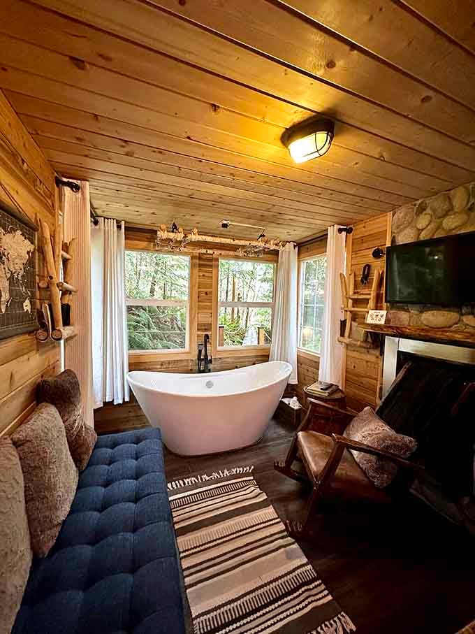 That freestanding tub with forest views proves someone finally understood what luxury actually means in the woods.